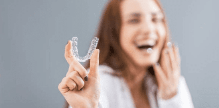 How to Deal With Invisalign Pain: 10 Dentist-Approved Tips